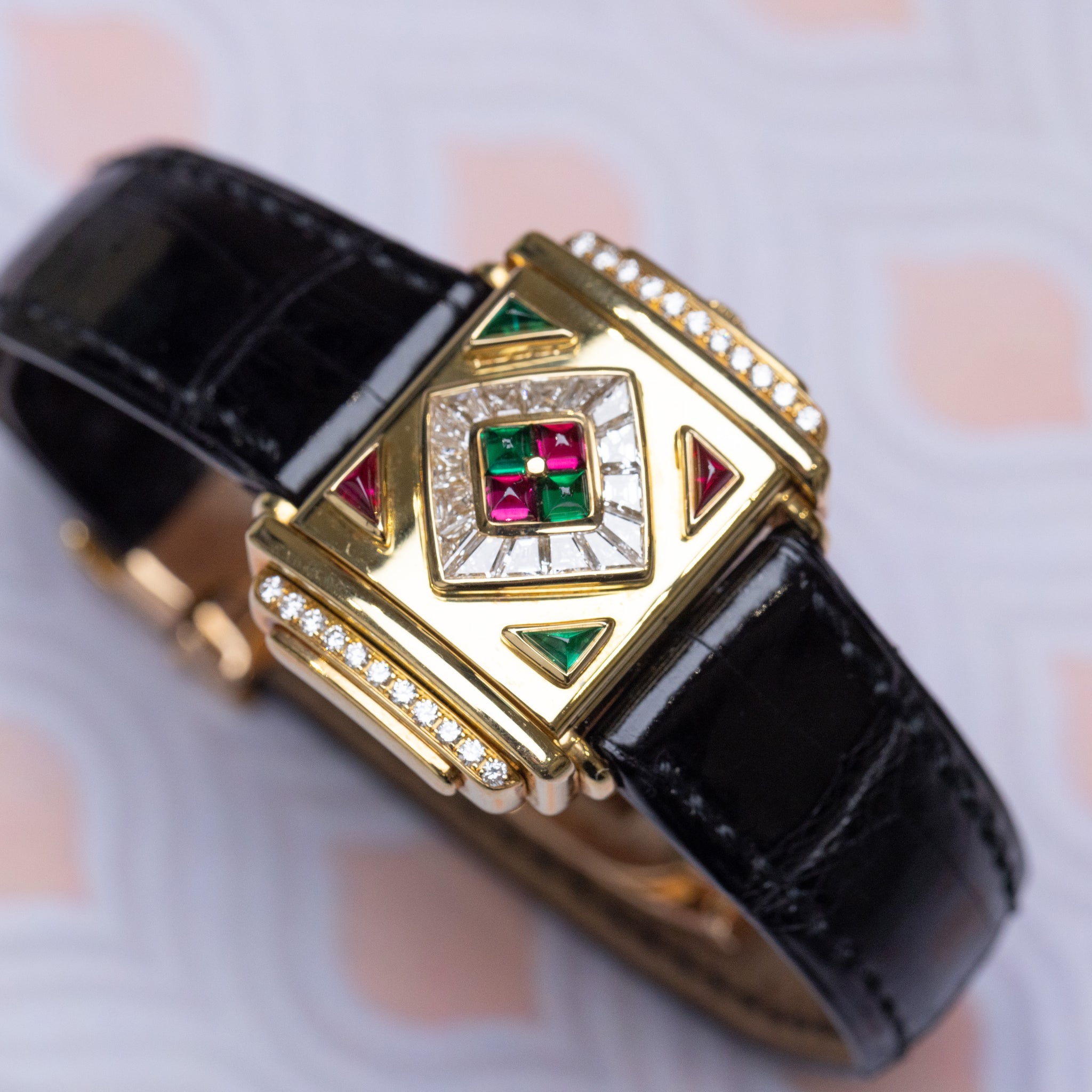 Rare Piaget Secret | REF. 16988 | Ruby, Emerald & 'Cut to Measure' Dia
